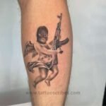 Explore the Intriguing Meaning Behind Angel with the AK-47 Tattoo (6 ...