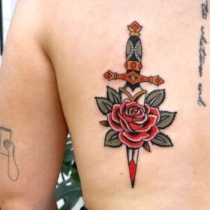 Rose and Dagger Tattoo Meaning & Why It’s So Iconic